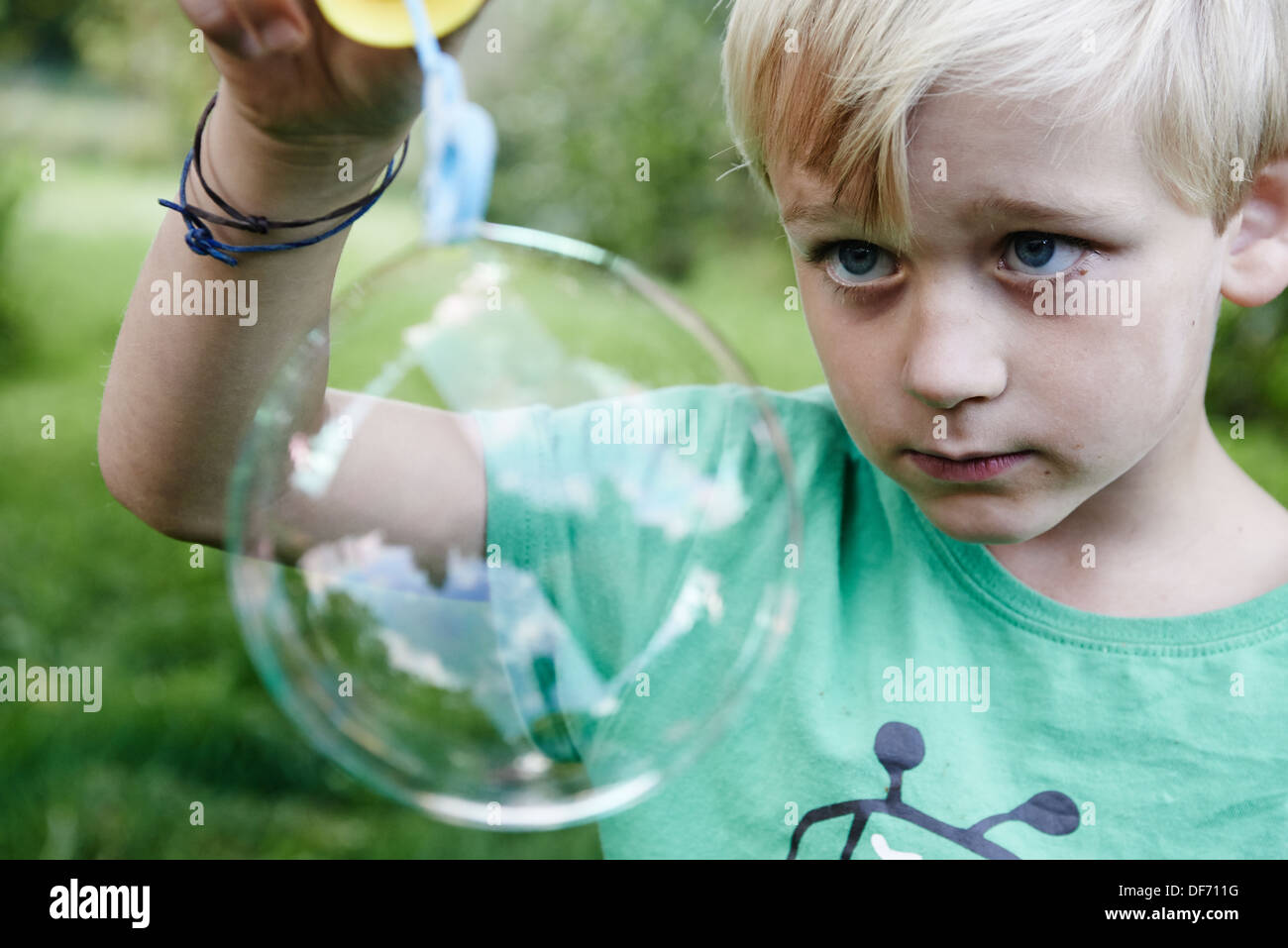 Child playing outdoor games hi-res stock photography and images - Alamy