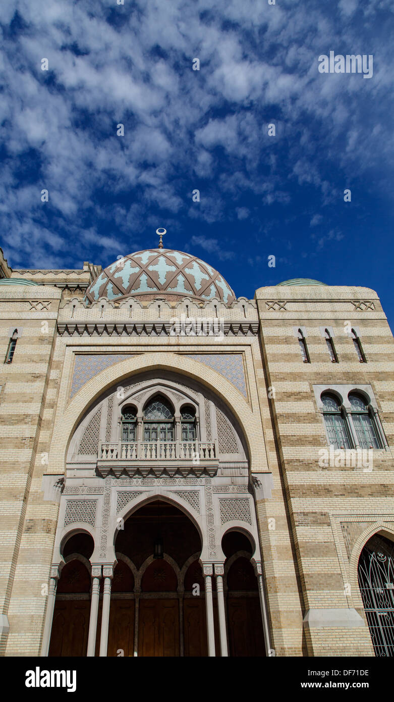 Ornate entrance in Moroccan style with dome under blue skies Stock ...
