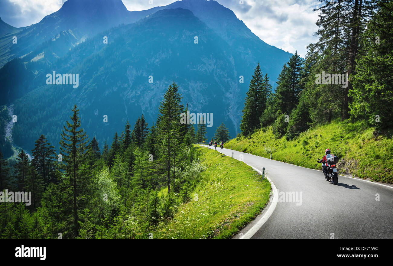 Motorcyclists in mountainous touring, extreme adventure, European ...
