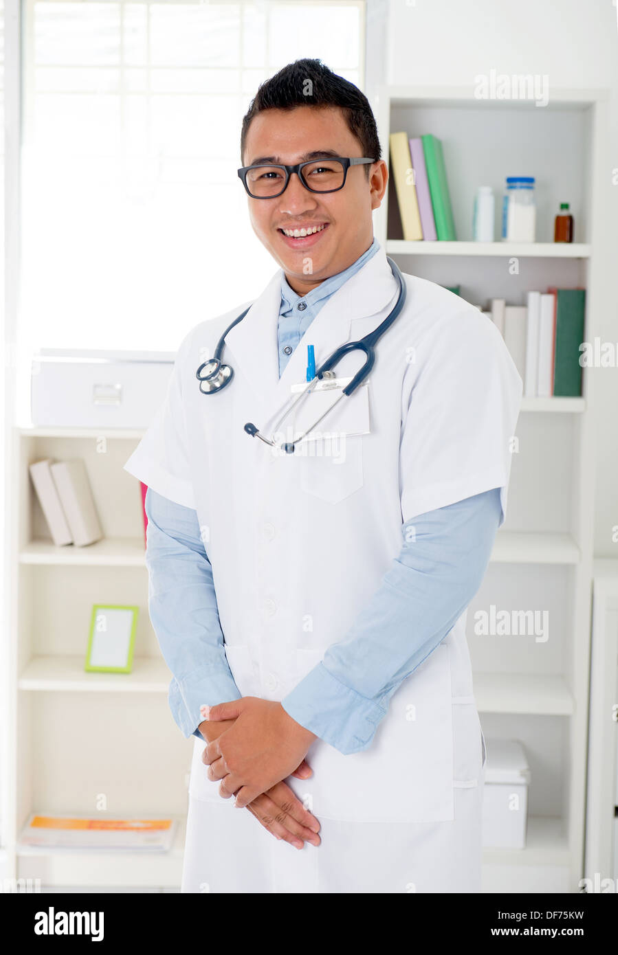 indonesian male doctor in the clinic Stock Photo - Alamy