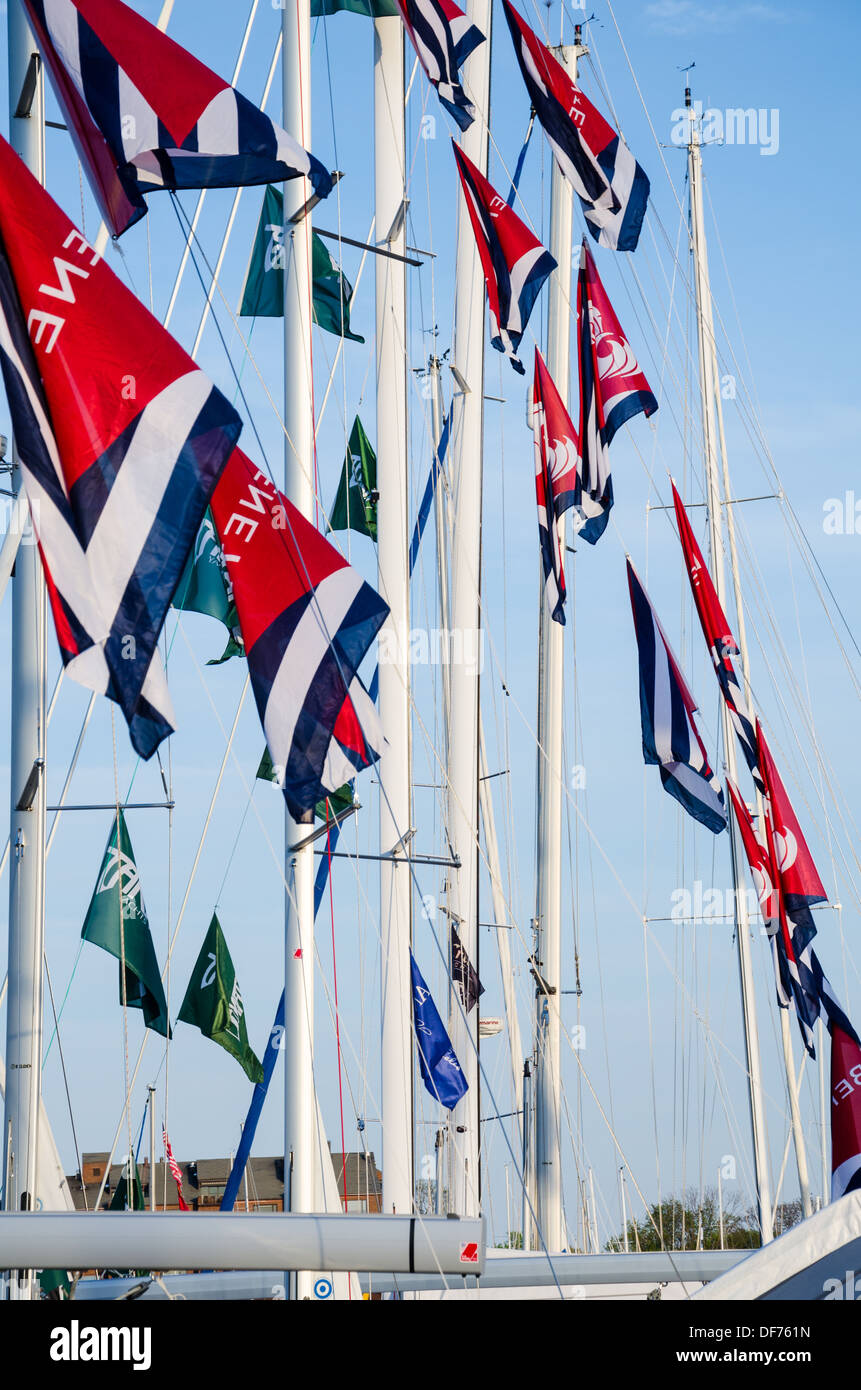 Flags flying from the masts of the boats at Annapolis Sailboat Festival ...