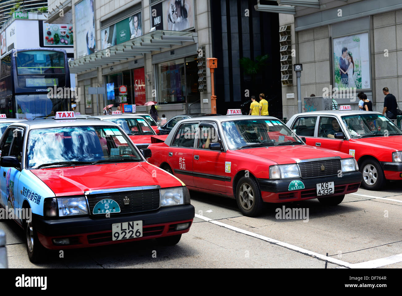 Red Toyota Hong Kong taxis Stock Photo - Alamy