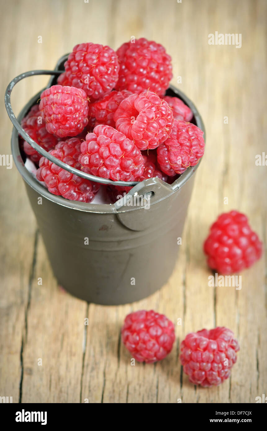 raspberry on old wood shoot in studio Stock Photo - Alamy