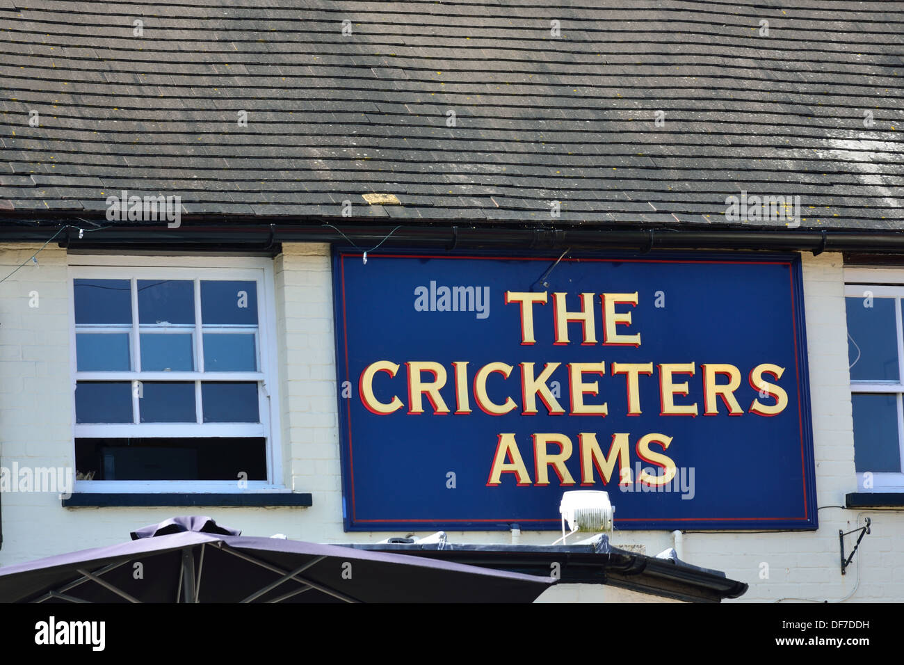 Cricketers arms pub sign Stock Photo - Alamy
