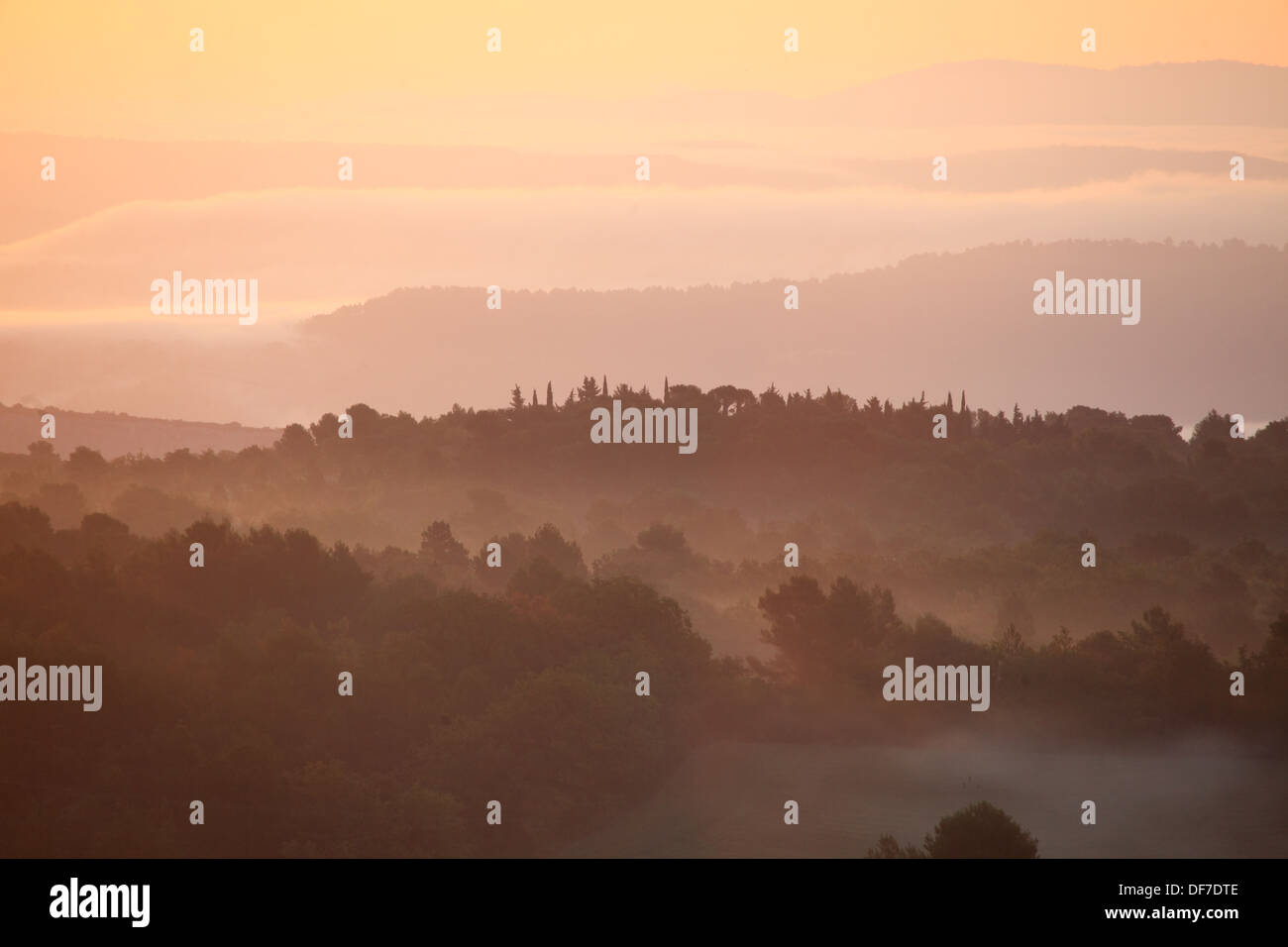 Misty sunrising above the Provence landscape Stock Photo - Alamy
