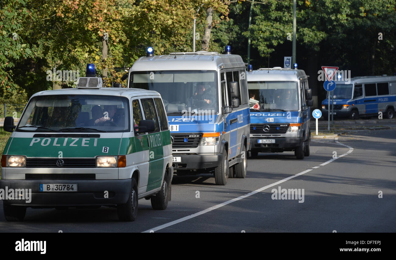 Berlin, Germany. 30th Sep, 2013. Police vehichles drive through Berlin ...
