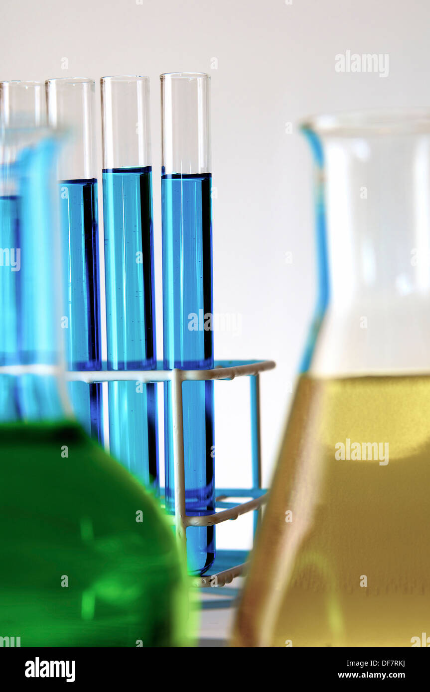 blue test tubes and bottles with white background Stock Photo - Alamy