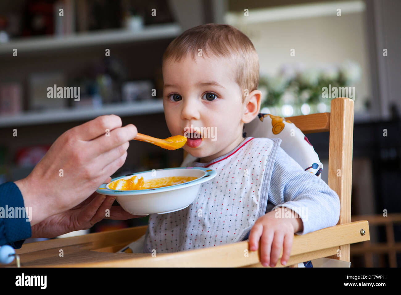 CHILD EATING A MEAL Stock Photo - Alamy