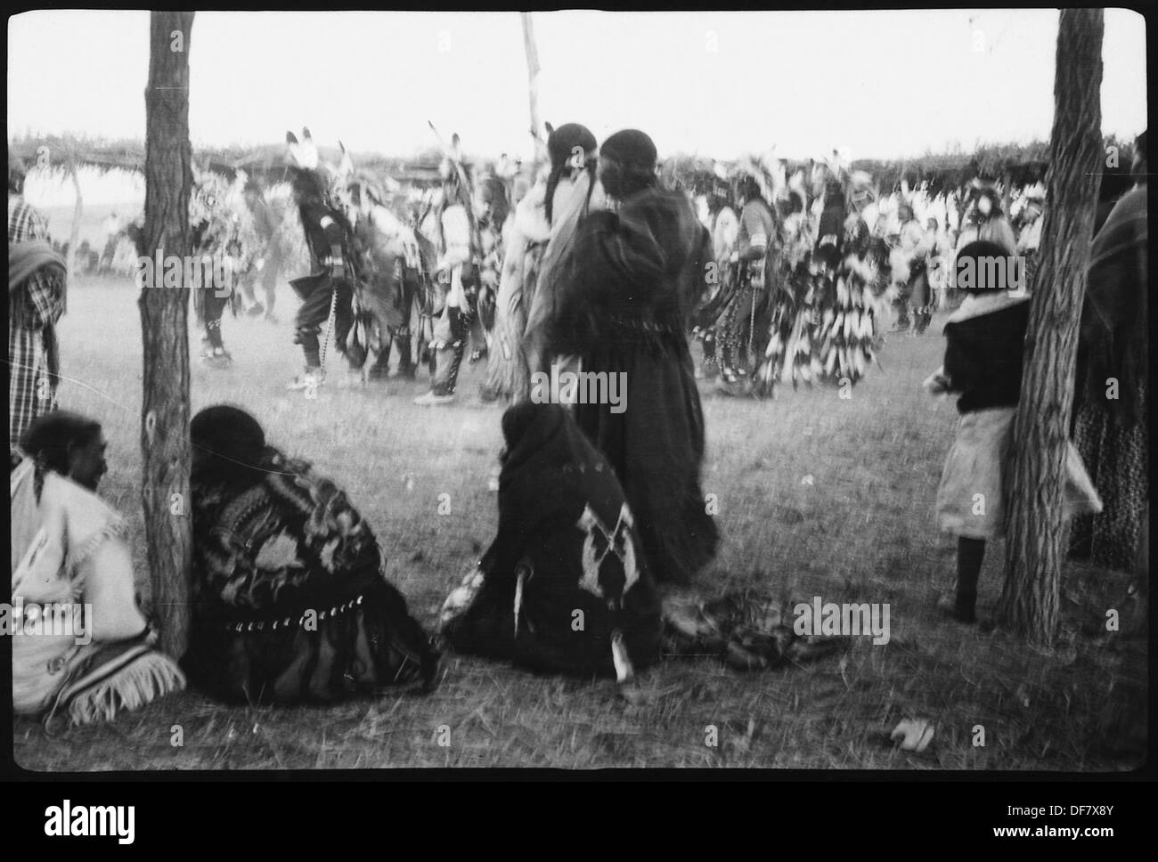 A public gathering of Native Americans, captured in this historical ...