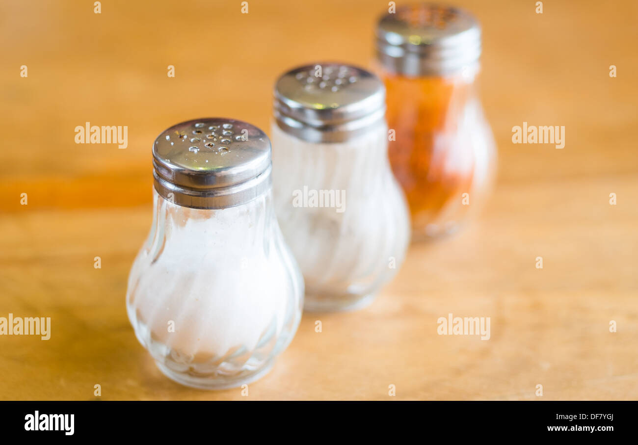 shaker glass bottle of salt and pepper for garnish food Stock Photo - Alamy