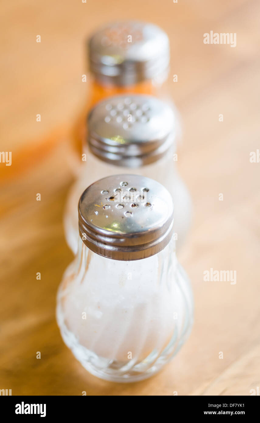 shaker glass bottle of salt and pepper for garnish food Stock Photo - Alamy