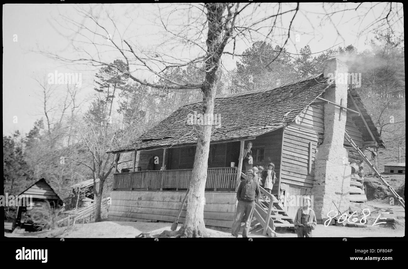 A photograph featuring Sam Ray and his family at their home ...