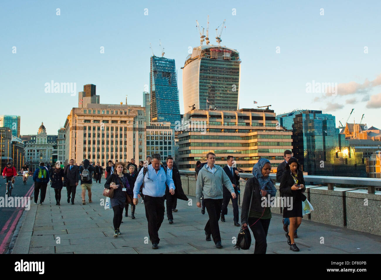 People crossing London bridge over the river Thames Stock Photo - Alamy