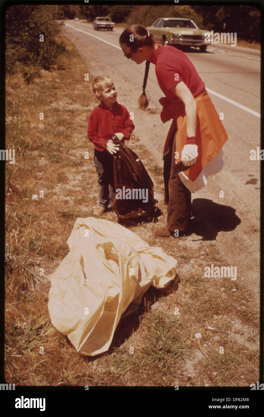 A roadside litter cleanup event, captured as part of the Documerica ...