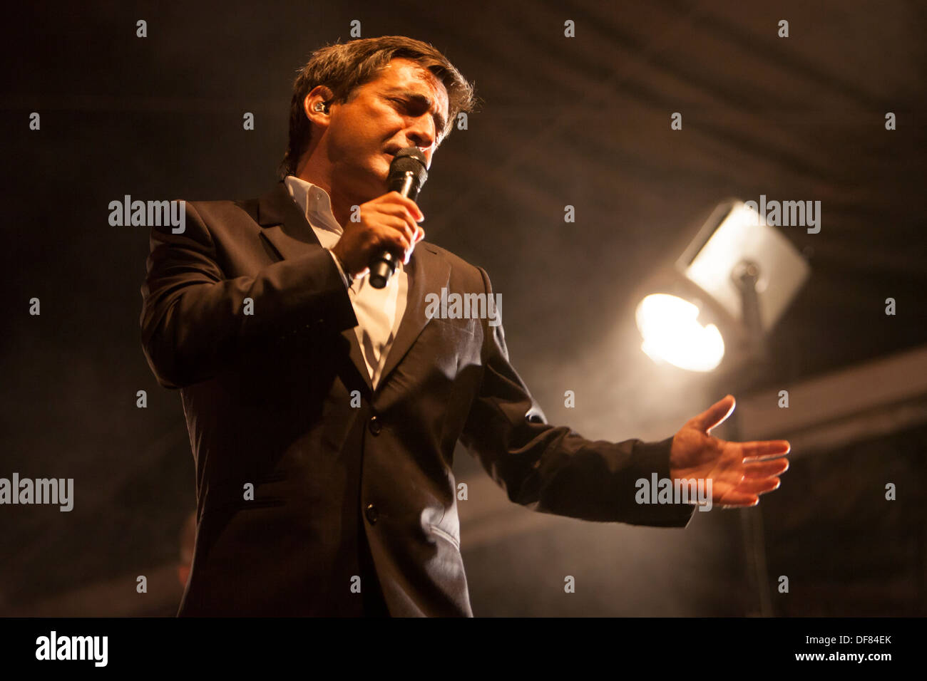 Fado singer Camané performing at Caixa Alfama fado festival, in Alfama ...
