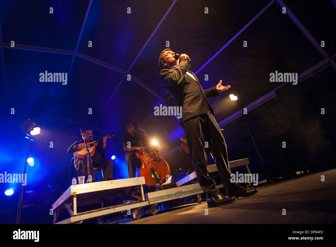 Fado singer Camané performing at Caixa Alfama fado festival, in Alfama ...