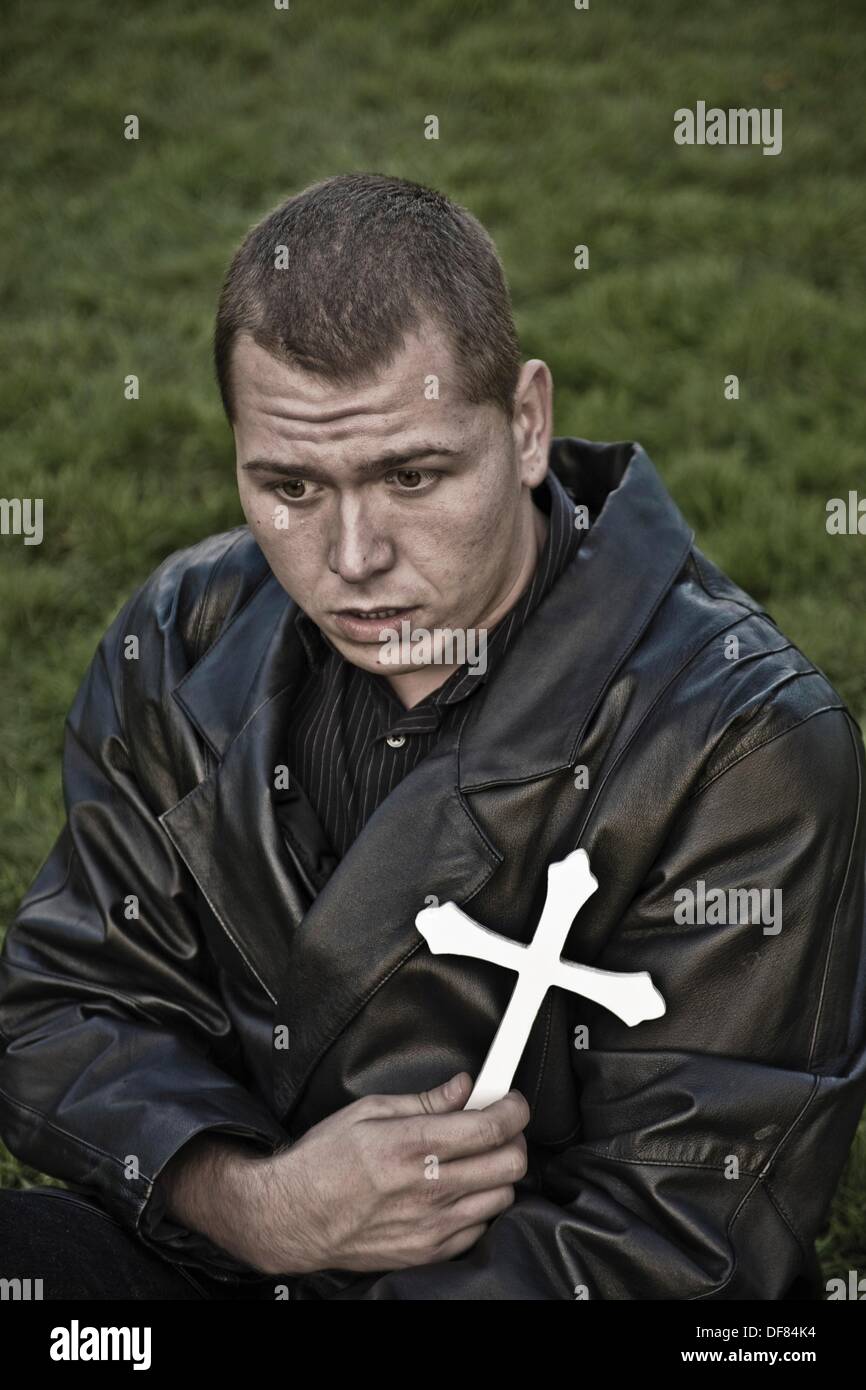 Holding a cross hi-res stock photography and images - Alamy