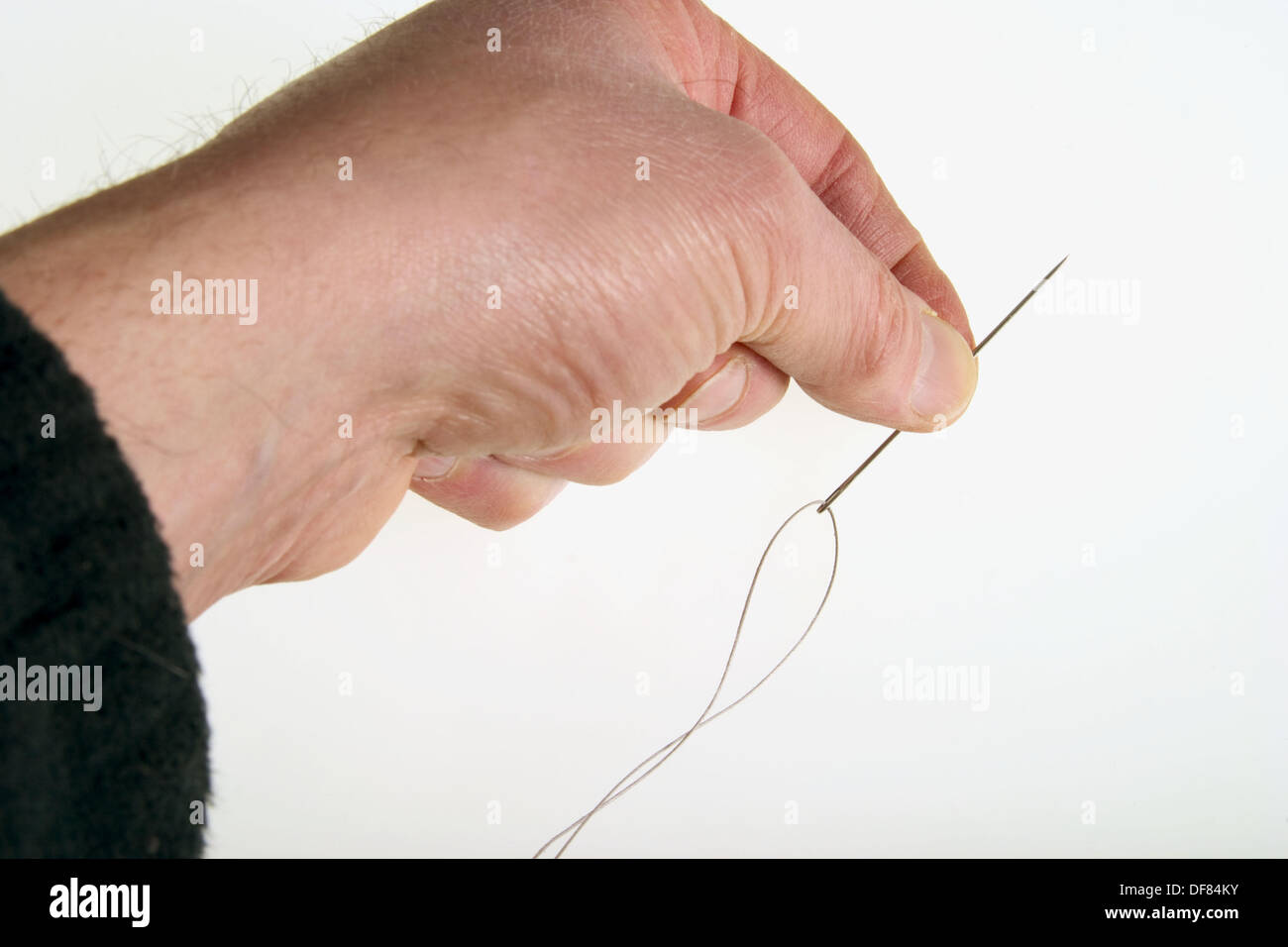 Threaded needle hi-res stock photography and images - Alamy
