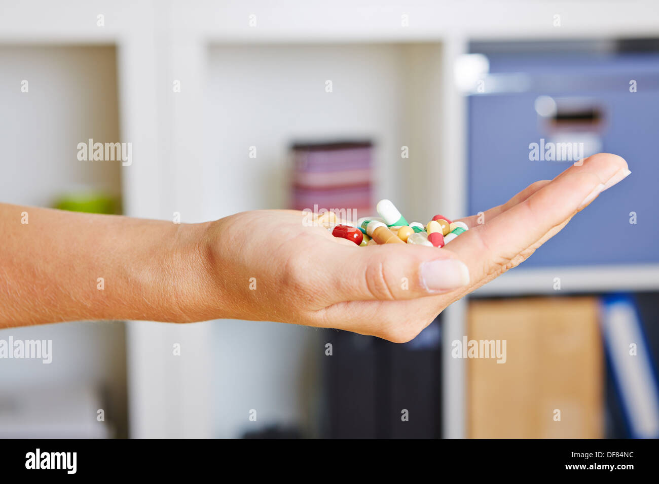 Medicines in hand hi-res stock photography and images - Alamy