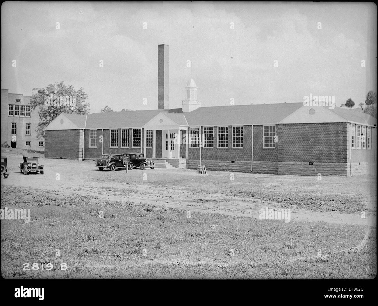 This image represents a school, possibly in a historic context ...