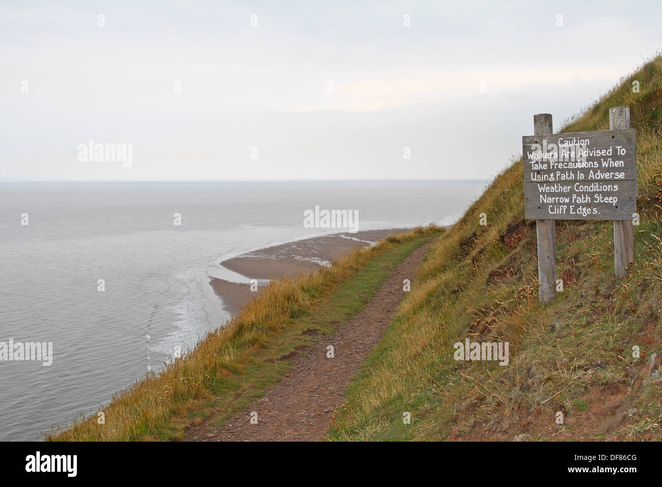 Exmoor National Park: warning sign on coastal path, Hurlstone Point ...
