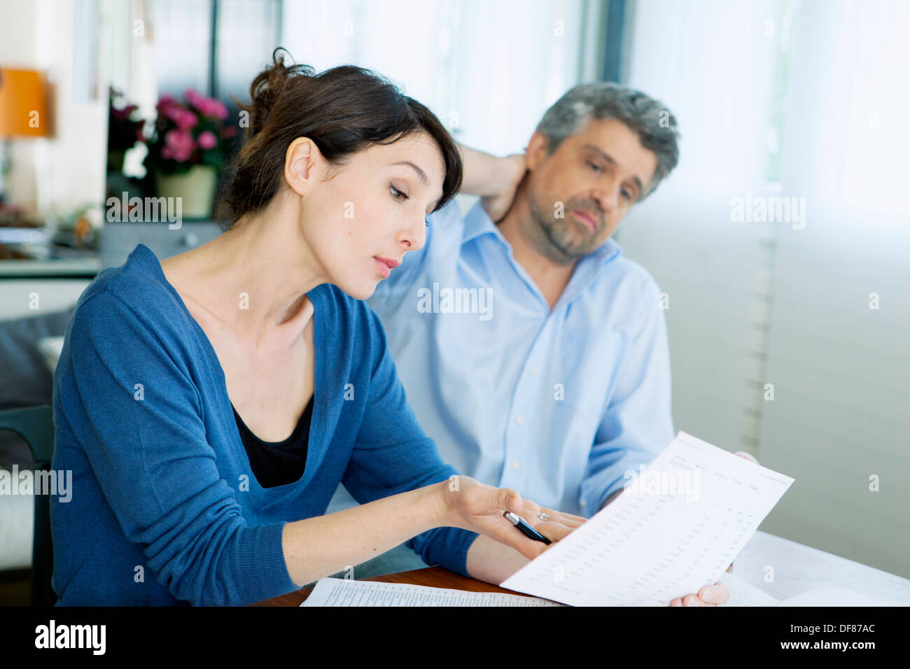 Woman fighting paperwork hi-res stock photography and images - Alamy