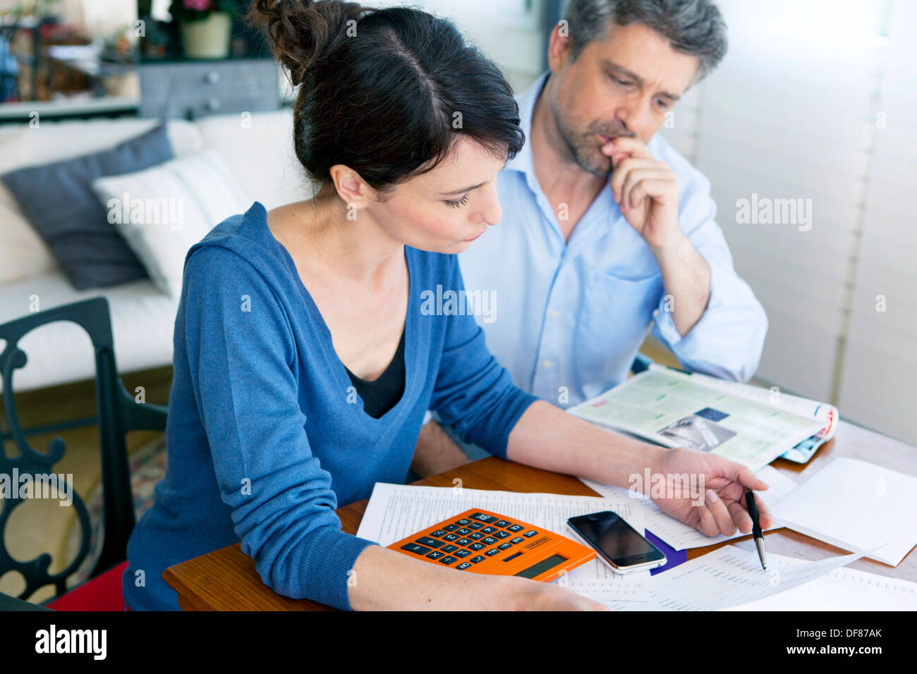 Mature woman worried paperwork hi-res stock photography and images - Alamy