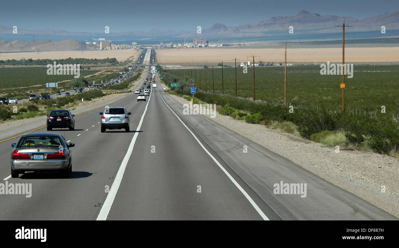 Cars drive down the interstate 15 leading through the Mojave desert in ...