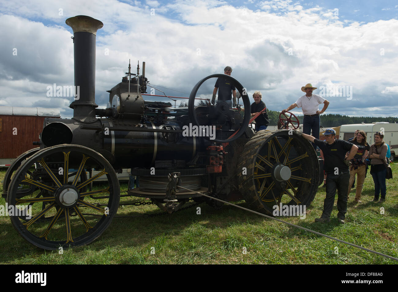 Old steam Engine in action pulling plough sledge Stock Photo - Alamy