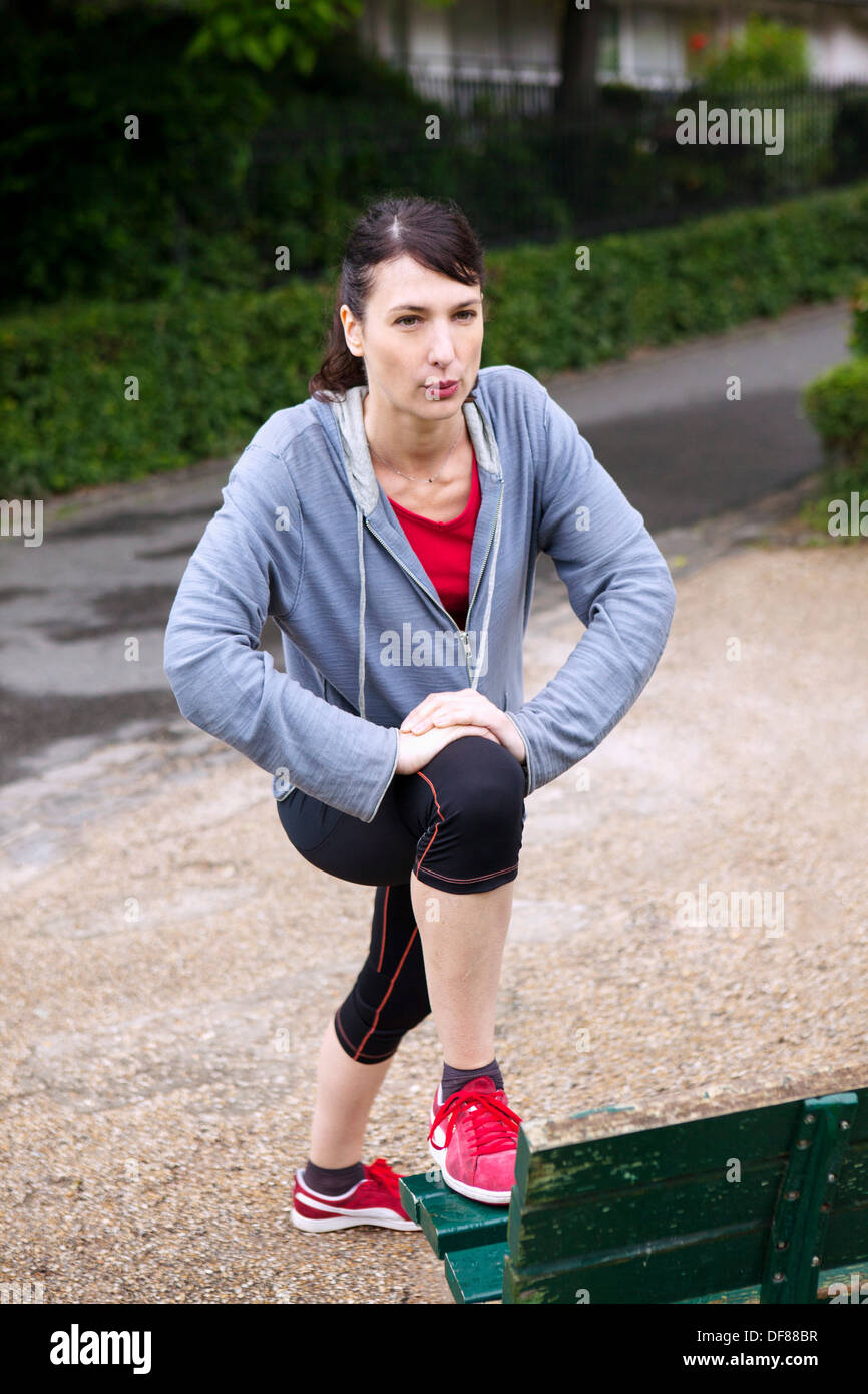 WOMAN PRACTISING A SPORT Stock Photo - Alamy