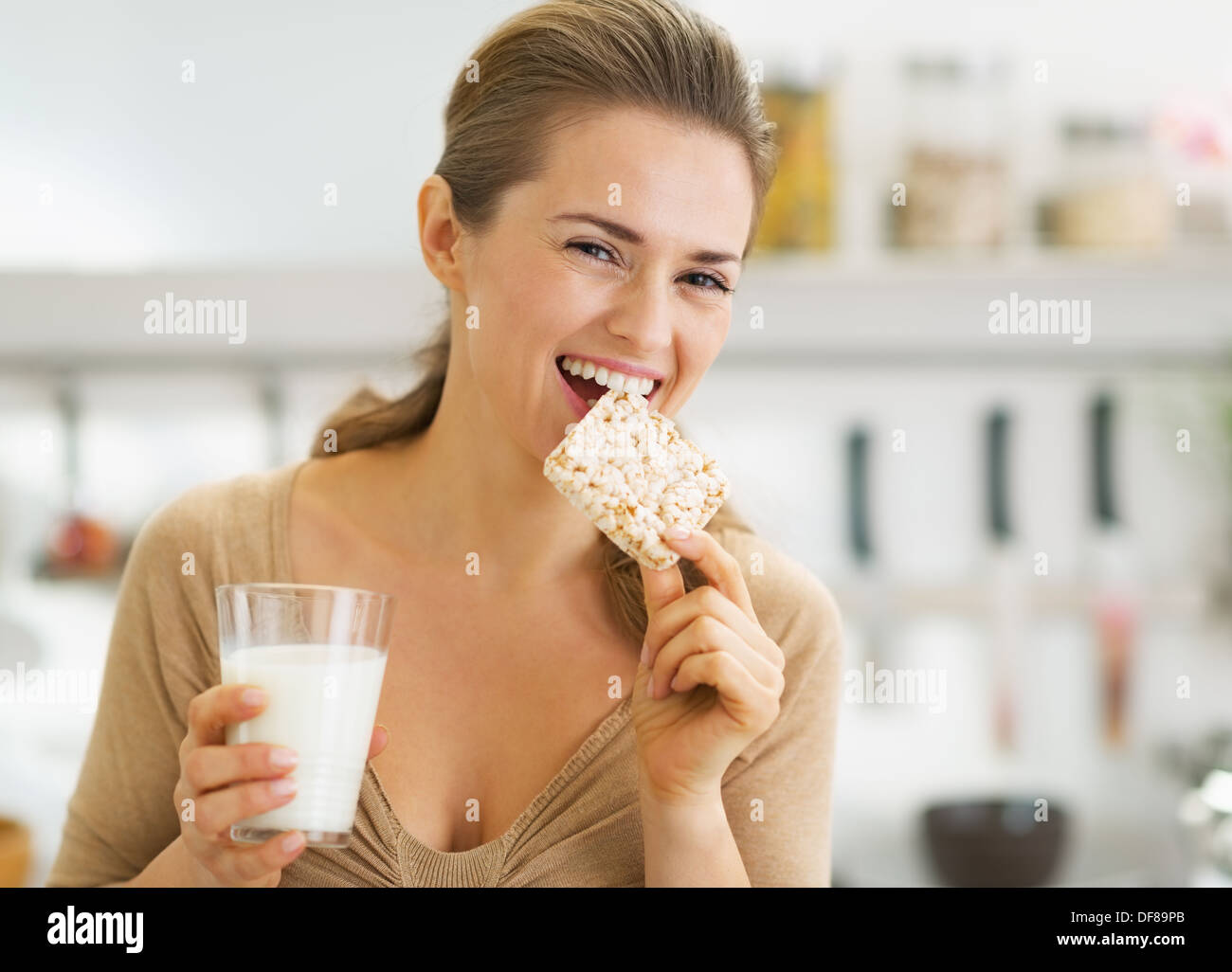 Woman eating cereal bread hi-res stock photography and images - Alamy