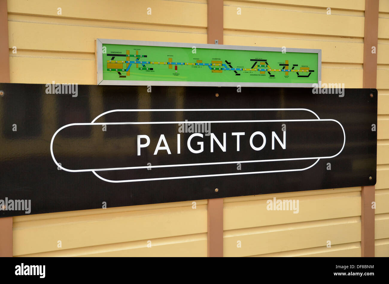 The station sign at the steam railway station at Paignton in Devon ...
