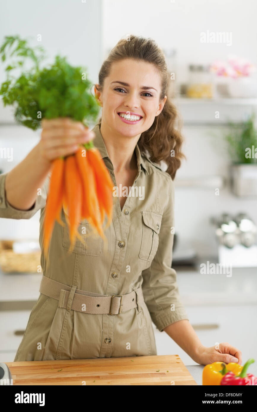 Giving carrot hi-res stock photography and images - Alamy