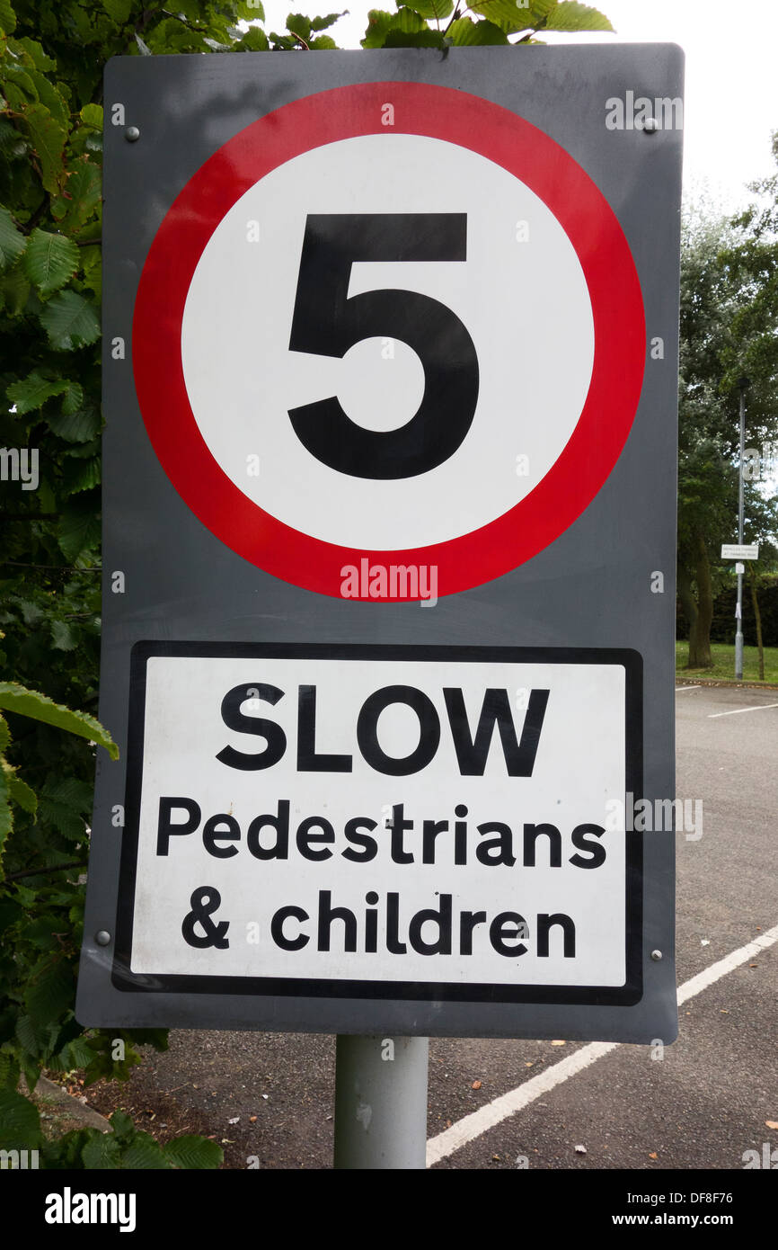 5 mph Slow pedestrians and children sign Stock Photo - Alamy