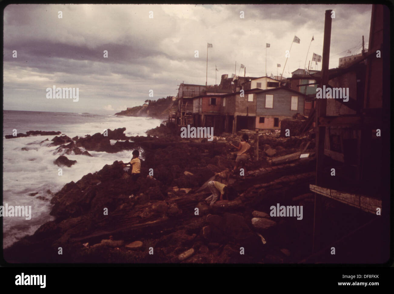 This photograph depicts a squatters' community as part of the ...