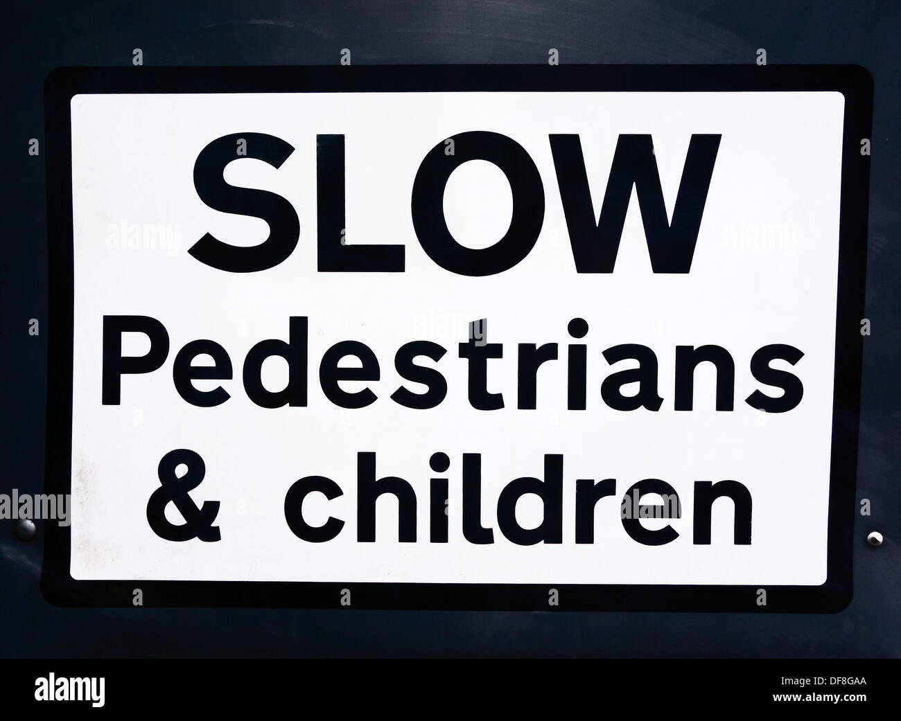 Slow pedestrians and children sign Stock Photo - Alamy
