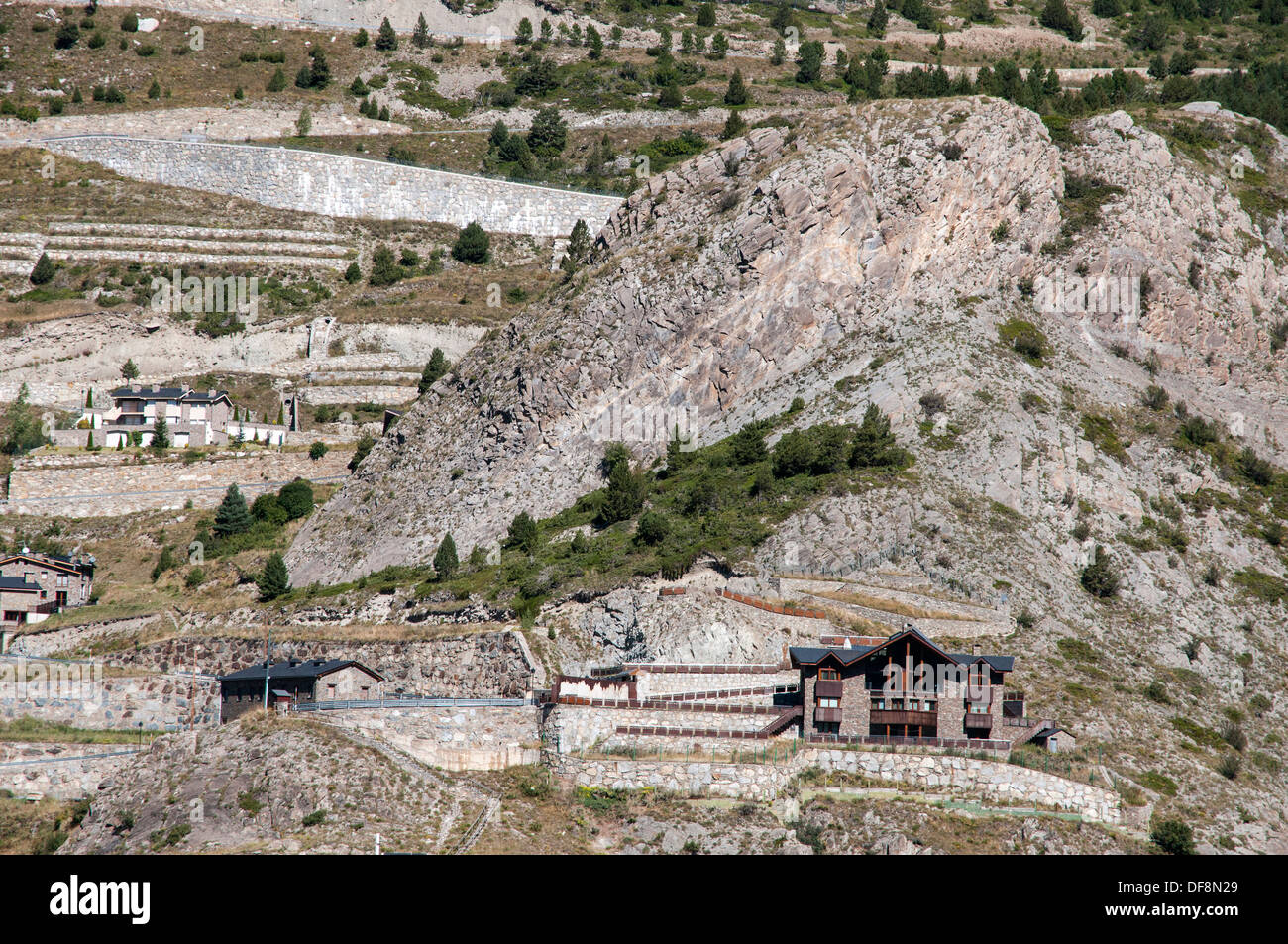 buildings high up the mountain with cliffs Stock Photo - Alamy