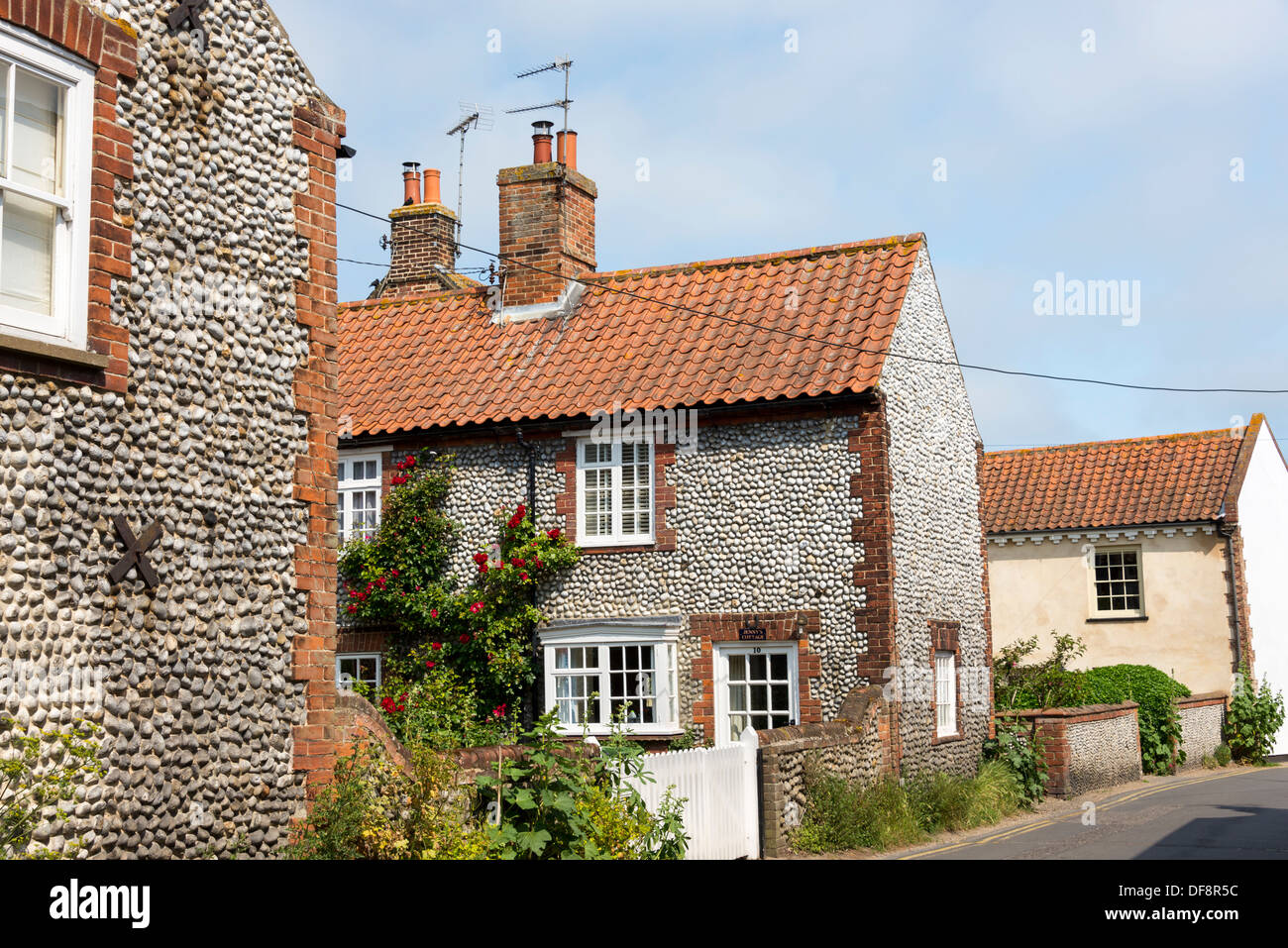 Brick and flint cottage, Blakeney, Norfolk, England Stock Photo - Alamy