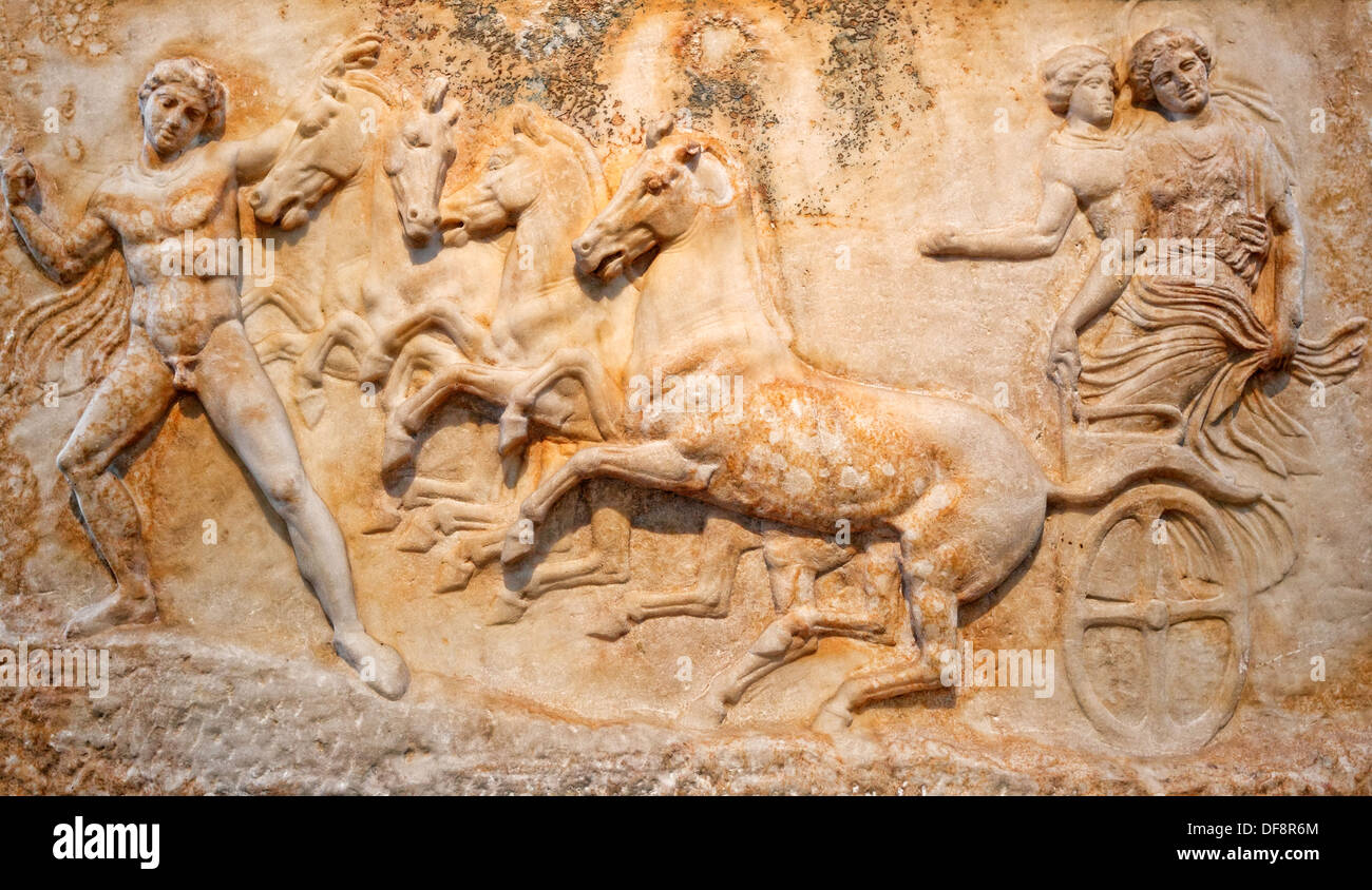 Marble votive relief of Hermes, who leads the charriot with the Nymph ...
