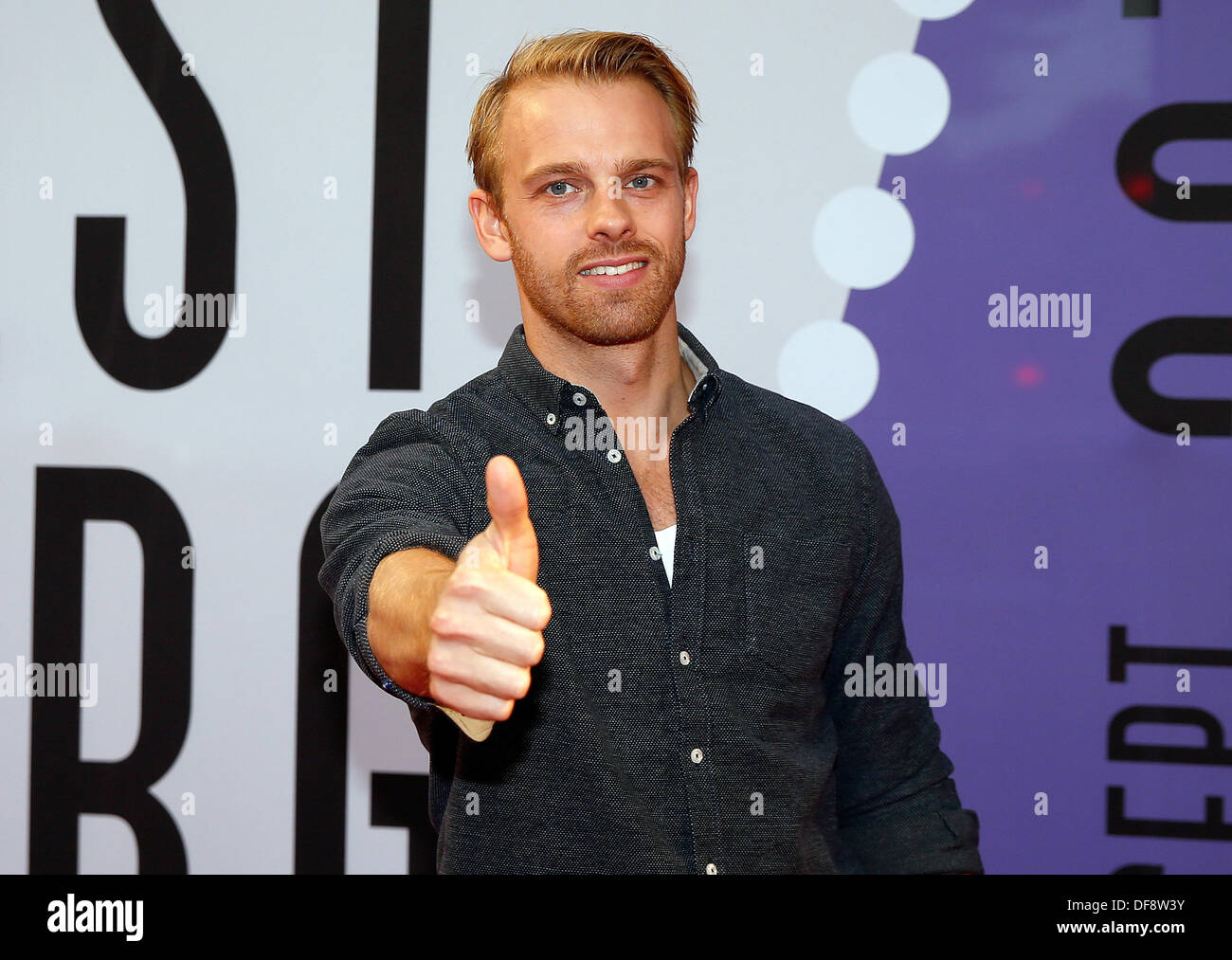 Hamburg, Germany. 30th Sep, 2013. Actor Mads Hjulmand poses on the red carpet at the Hamburg ...