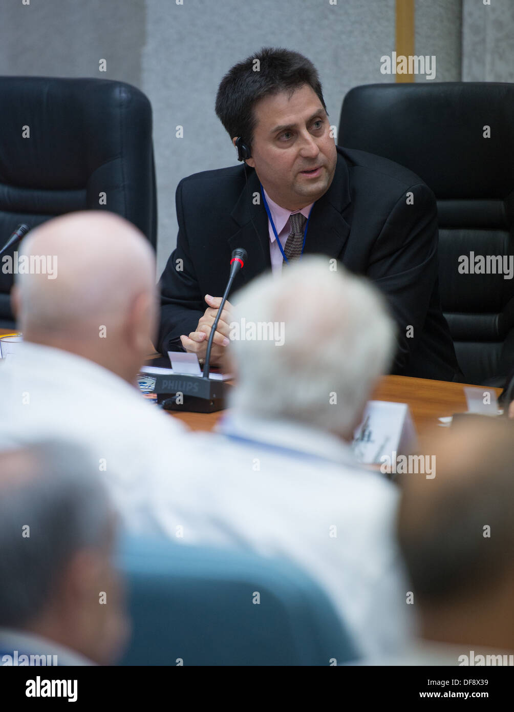 The Expedition 37 crew holds a press conference at Baikonur Cosmodrome ...