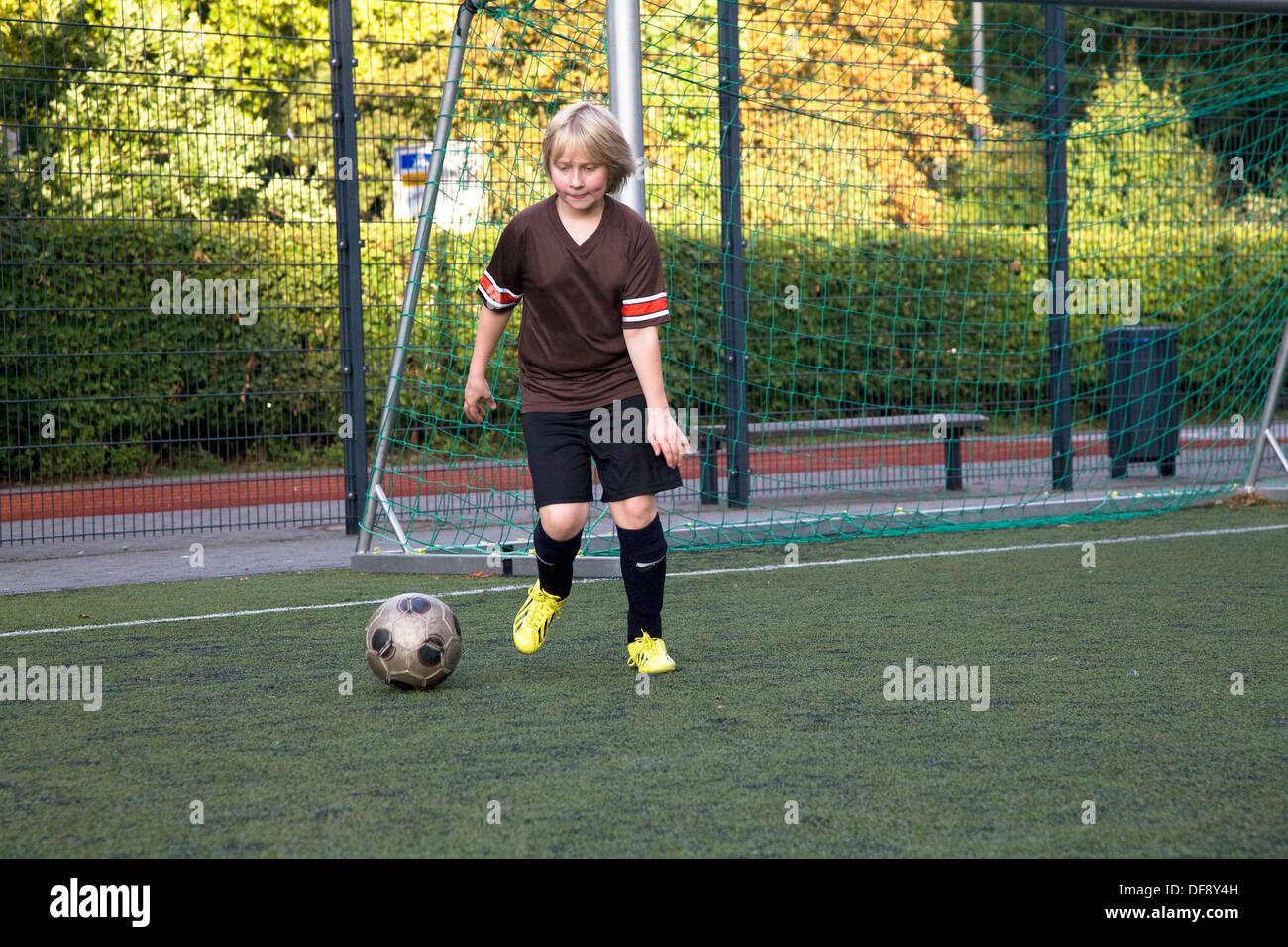 boy playing soccer Stock Photo - Alamy