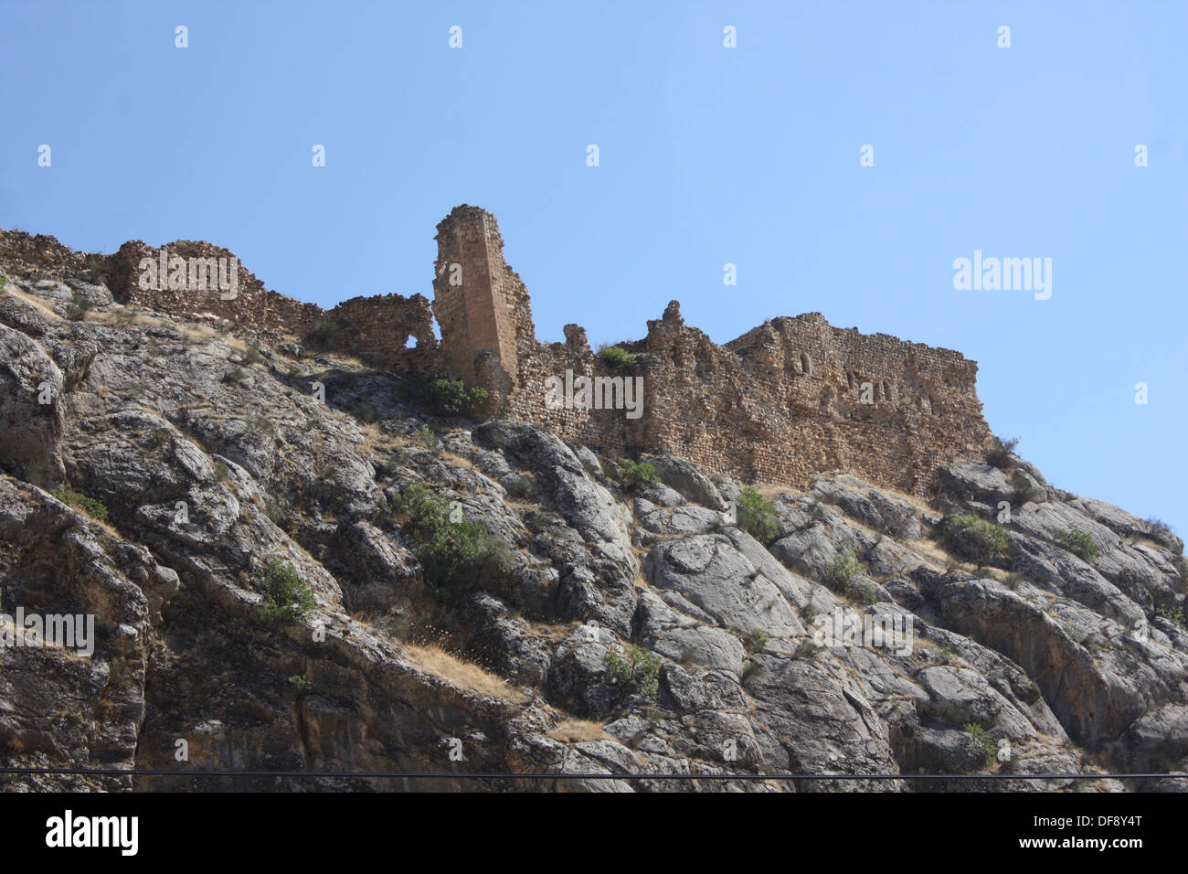 The ruins of the castle keep at Yenikale clinging to the cliff Stock ...