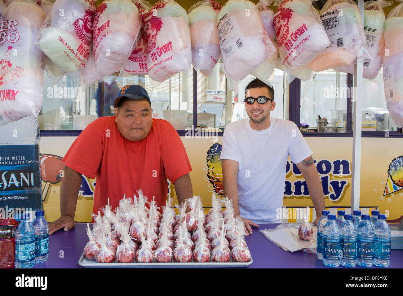 Carnival booth workers hi-res stock photography and images - Alamy
