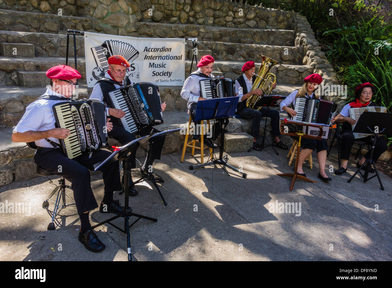 The Accordion International Musical Society playing outside and wearing ...