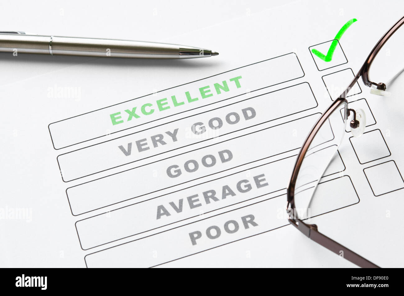 Survey form close up with tick on excellent Stock Photo - Alamy