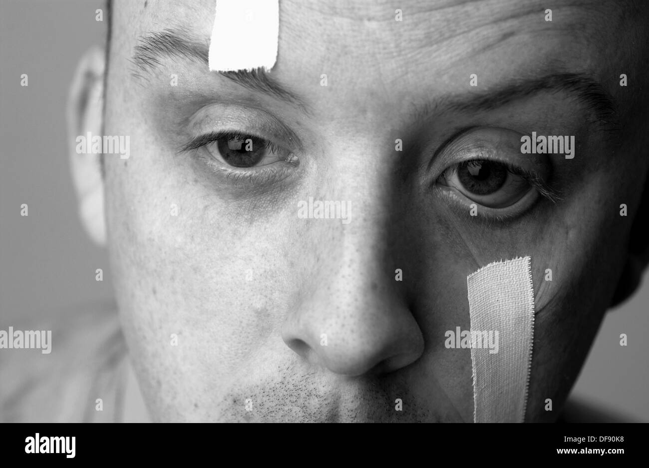 Eyes taped open hi-res stock photography and images - Alamy