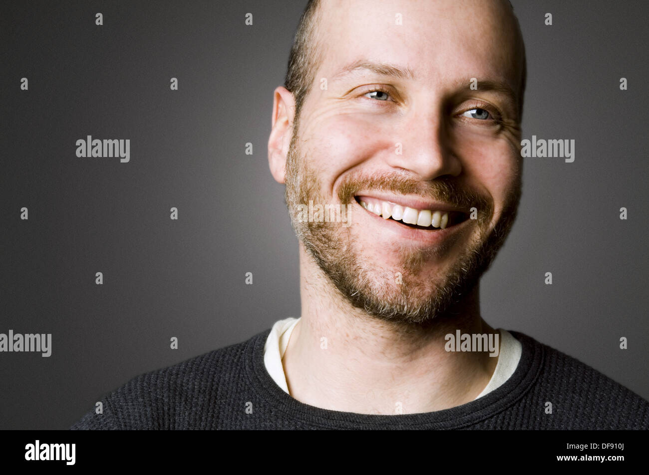 Scruffy man smiling hi-res stock photography and images - Alamy