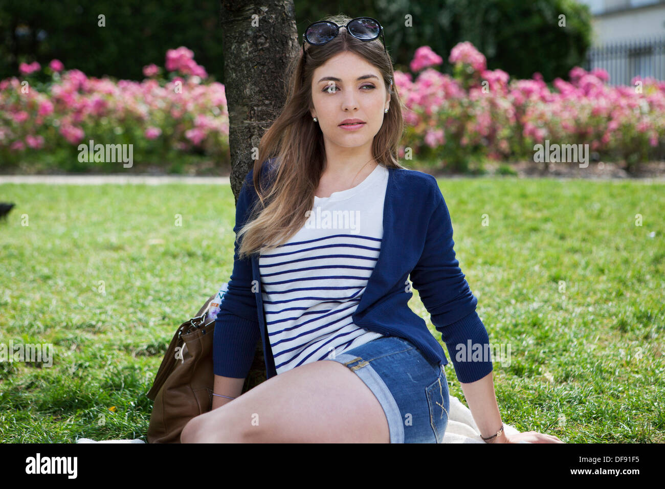 Woman resting outside hi-res stock photography and images - Alamy