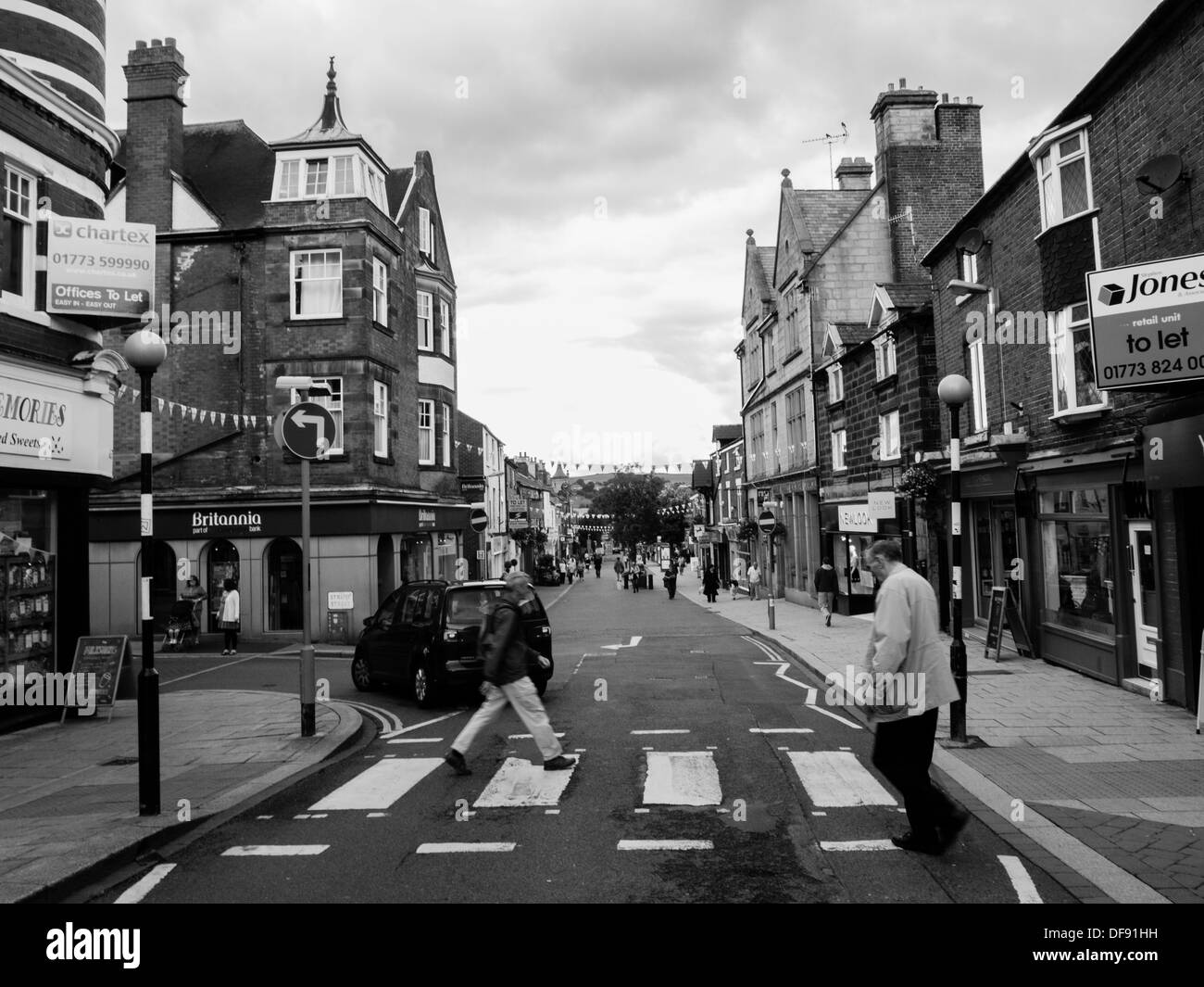 Old man crossing road old Black and White Stock Photos & Images - Alamy